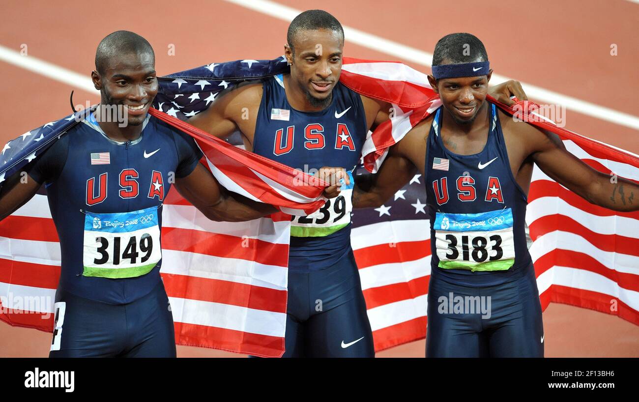 The United States' trio of Kerron Clement, silver, Angelo Taylor, gold ...