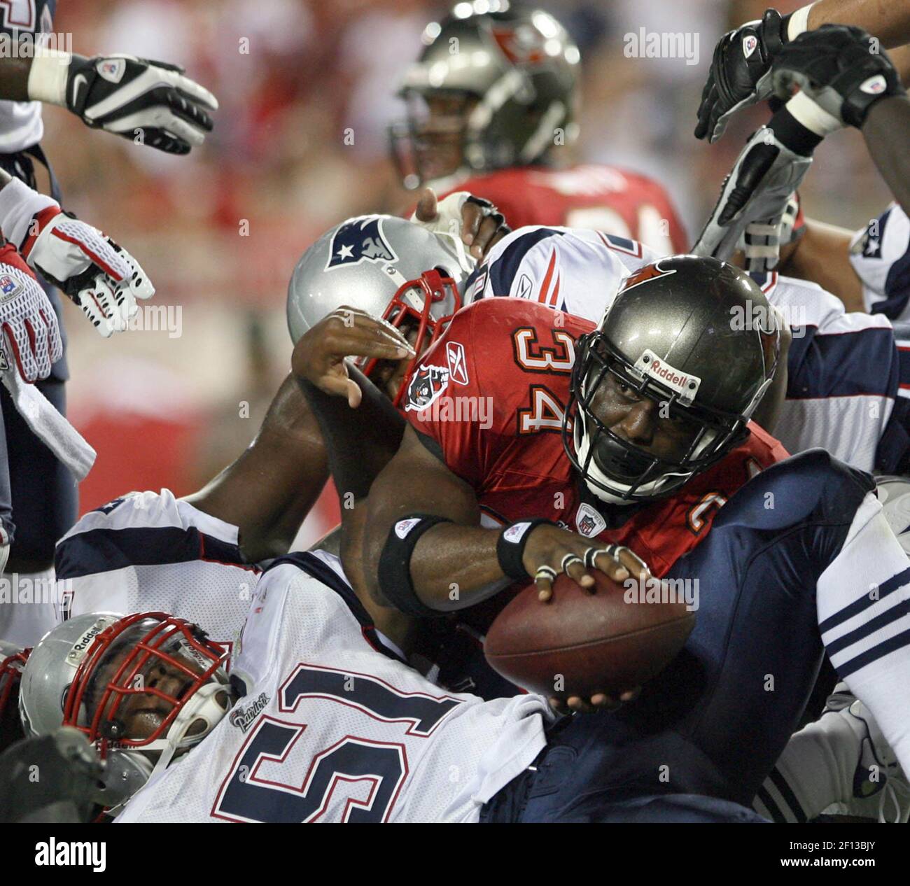 Tampa Bay Buccaneers running back Earnest Graham extends the ball ...