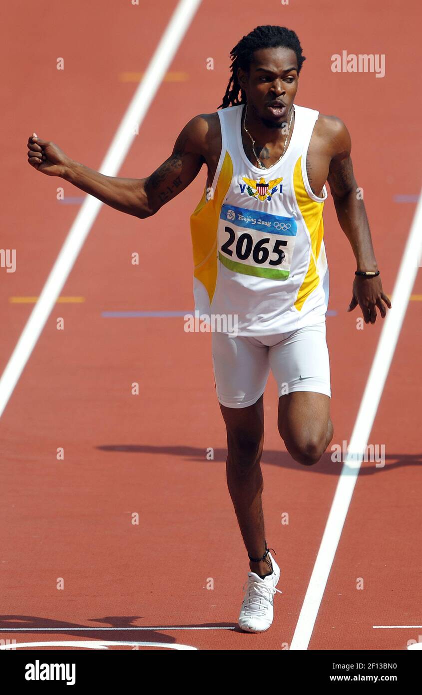 Tabarie Henry of the Virgin Islands competes in 400-meter qualifying in ...