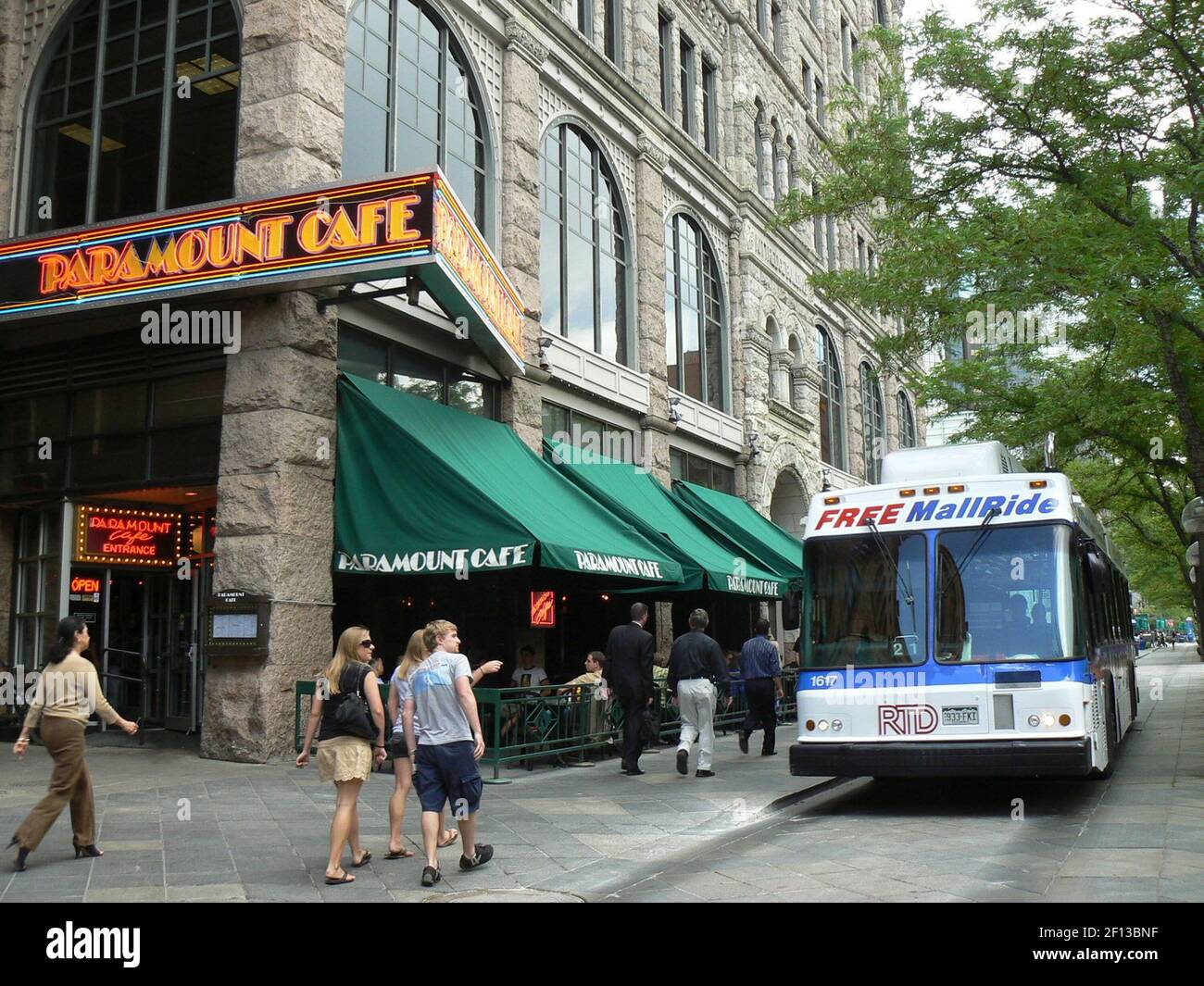 Free hybrid electric buses shuttle along the 16th Street Mall, a mile ...