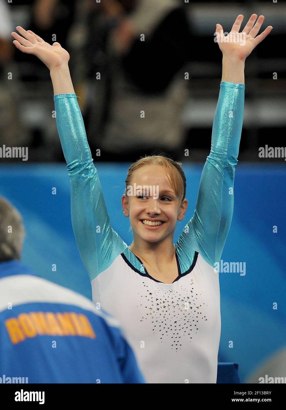 Sandra Izbasa of Romania waves to the crowd after winning gold in ...
