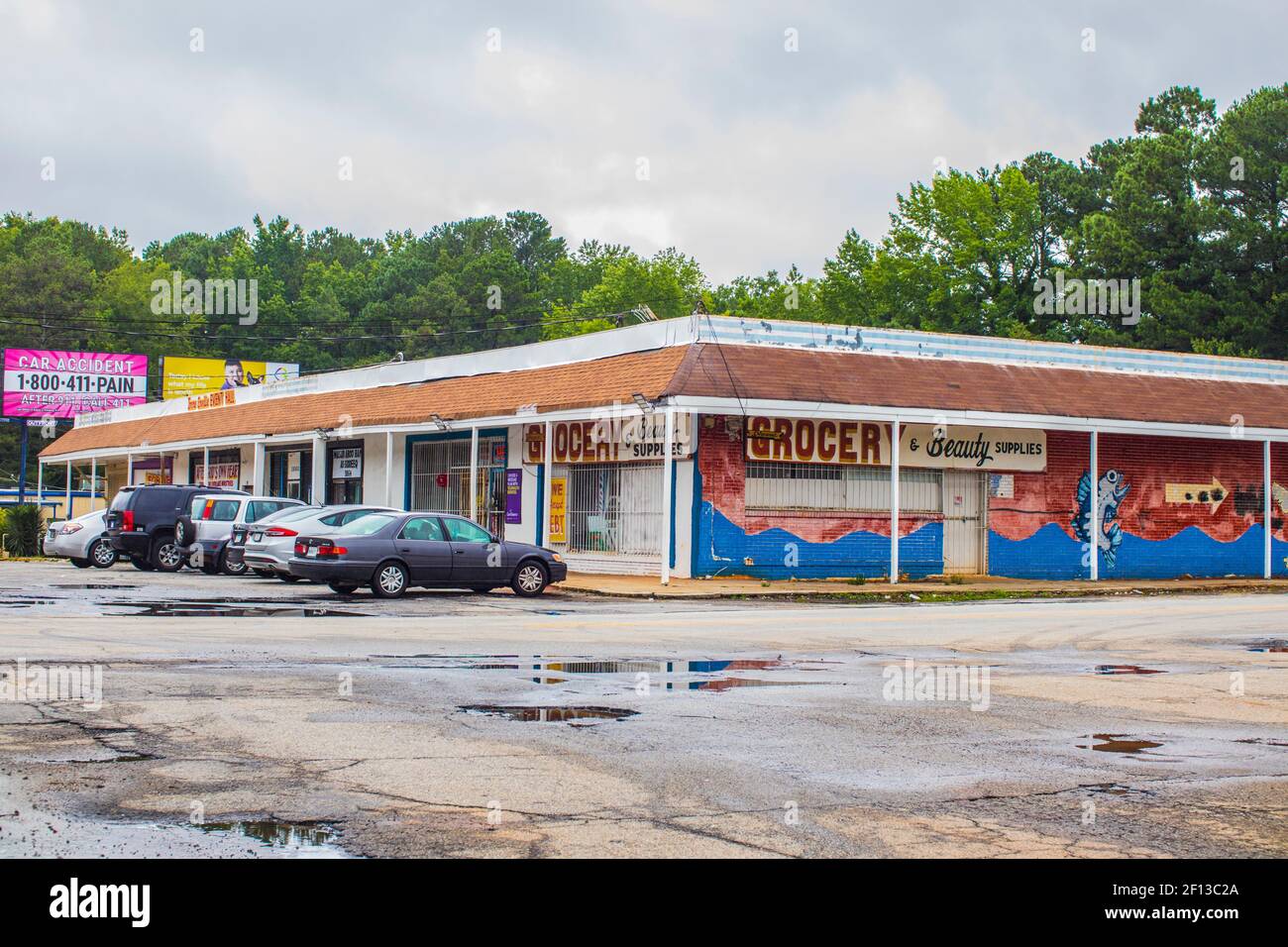 Decatur, Ga / USA - 07 07 20: Urban shopping center and cars background ...