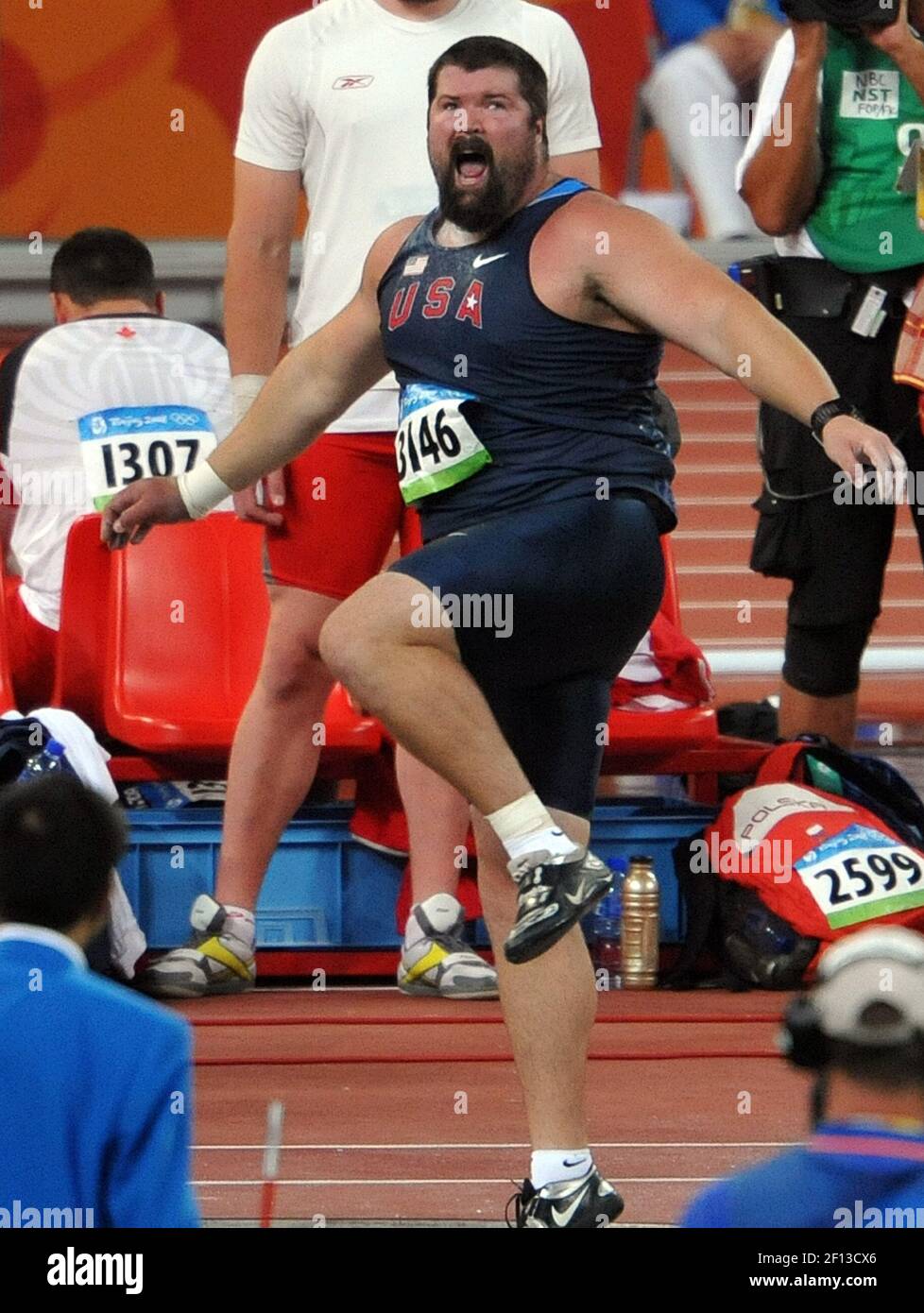 Christian Cantwell of the United States competes in the shot put on ...
