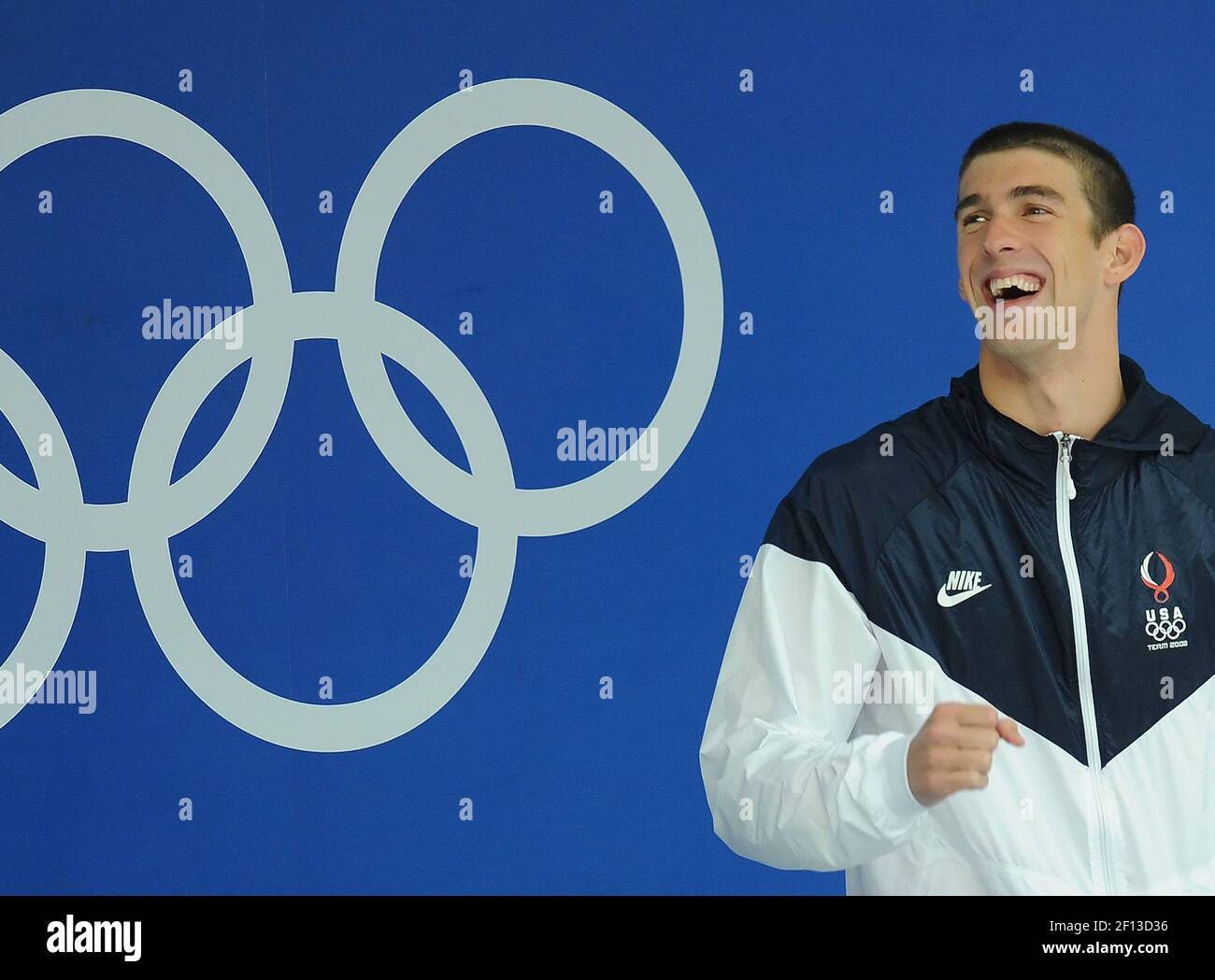 Michael Phelps of the United States smiles before receiving his gold ...