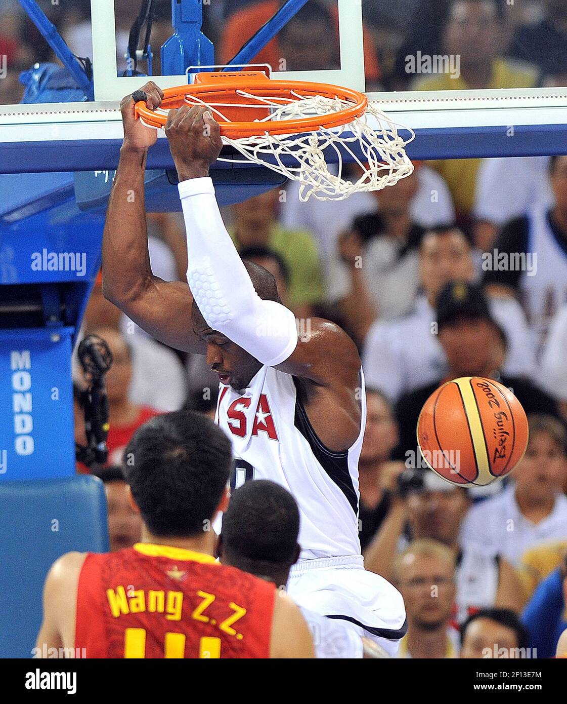 USA's Dwayne Wade (9) dunks in the 1st quarter quarter of their opening ...