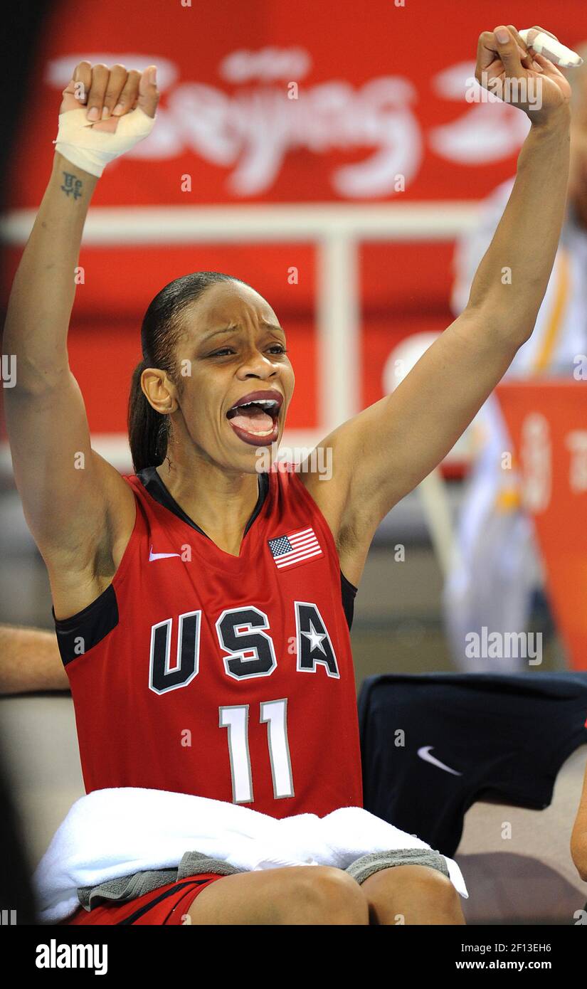 Tina Thompson of the United States reacts to her team's victory over ...