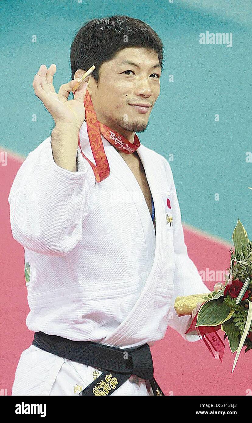 Japan's Masato Uchishiba won his second straight Olympic gold medal, pinning France's Benjamin ...