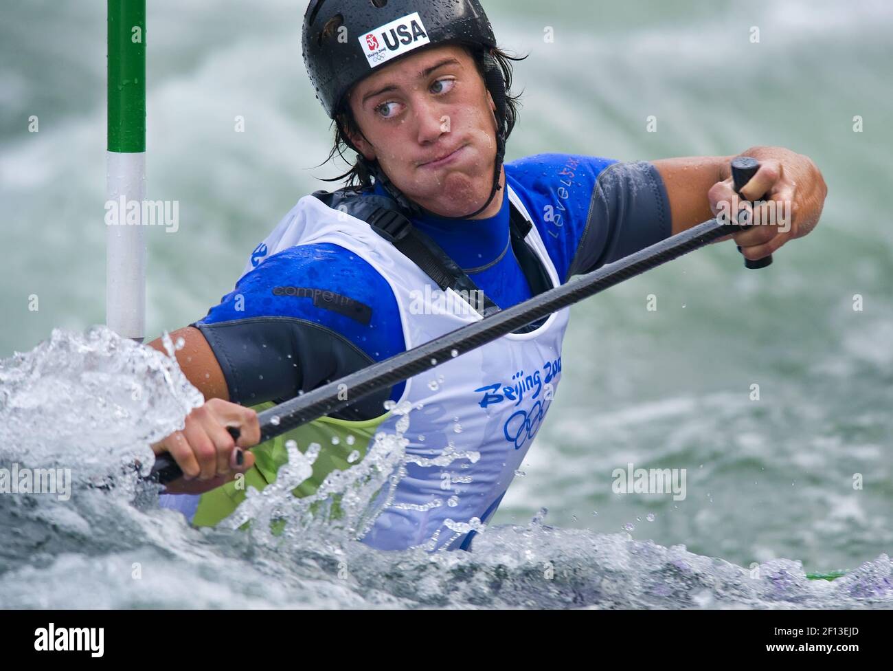 Ben Fraker of the United States paddles the whitewater slalom course ...