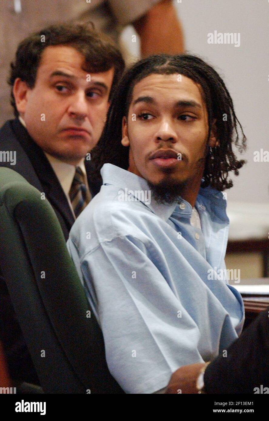 Murder defendant Demario Atwater, 22, right, turns in his chair at the ...