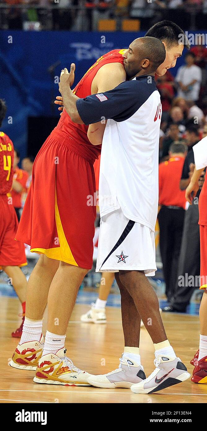 China's Yao Ming and USA's Kobe Bryant hug after their opening round ...