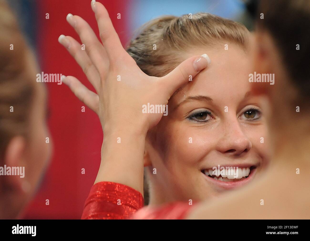 Shawn Johnson of the United States smiles after competing during ...