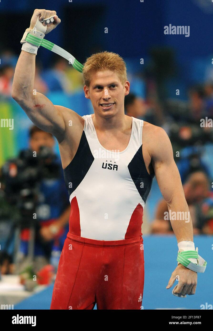 Justin Spring of the United States acknowledges the crowd after ...