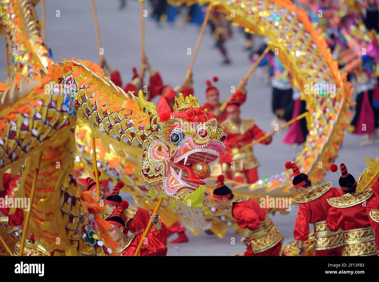 Chinese dragons entertain the crowd in the National Stadium before the ...