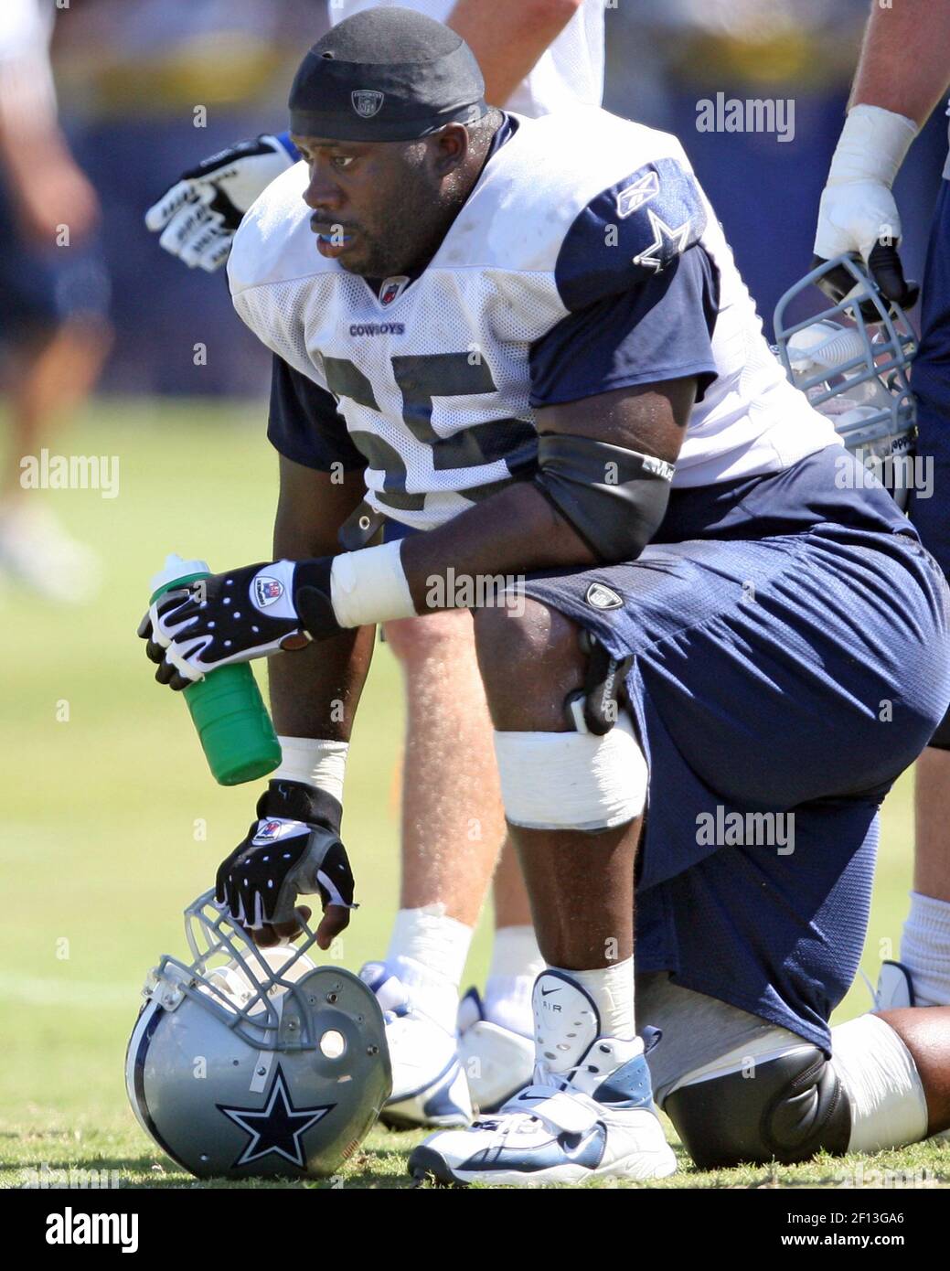 Dallas Cowboys center Andre Gurode takes a knee during practice at ...