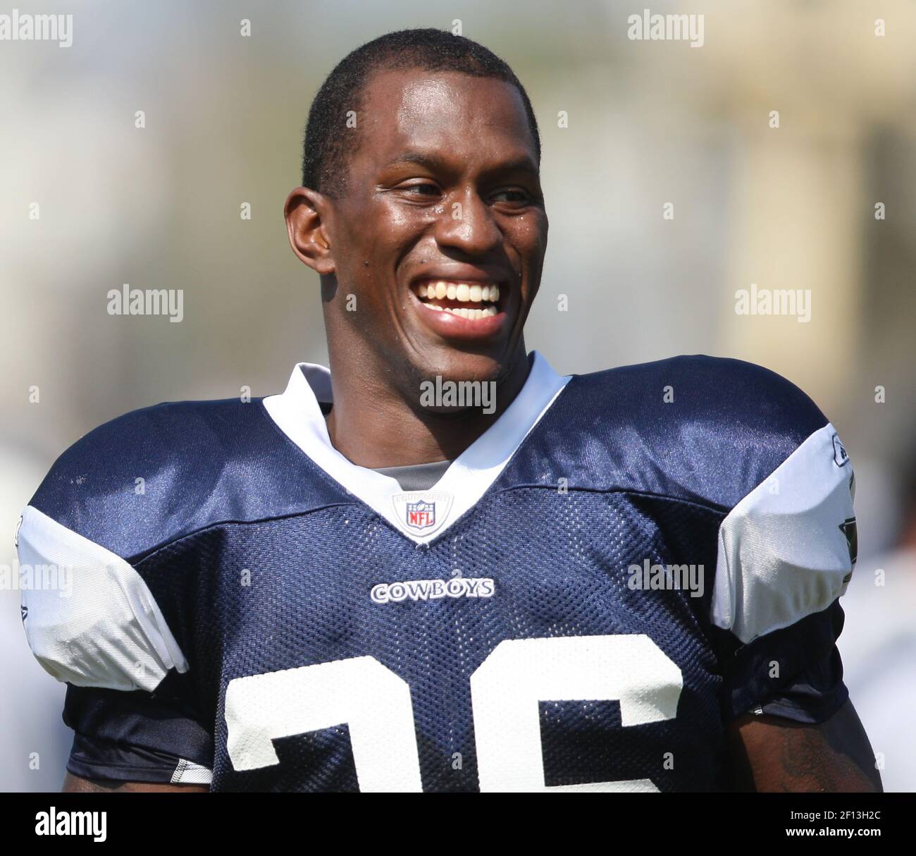 Dallas Cowboys safety Ken Hamlin laughs while talking with teammates ...