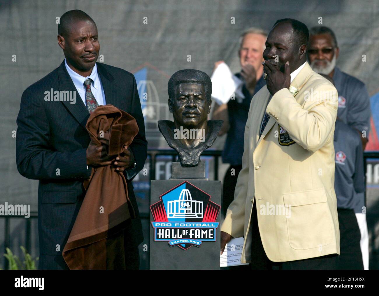 Derek Thomas helps his father Emmitt Thomas, of the Kansas City Chiefs ...