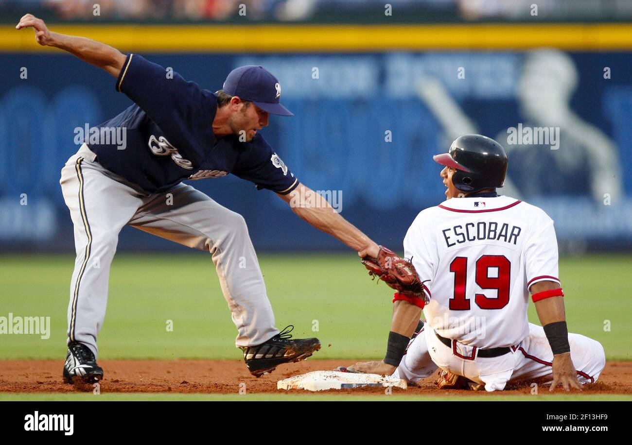 Milwaukee Brewers' J.J. Hardy tags out Atlanta Braves' Yunel Escobar at ...
