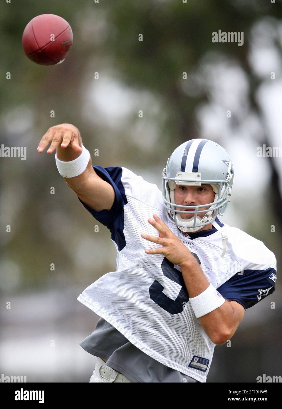 Dallas Cowboys quarterback Tony Romo delivers a pass during the Cowboys ...