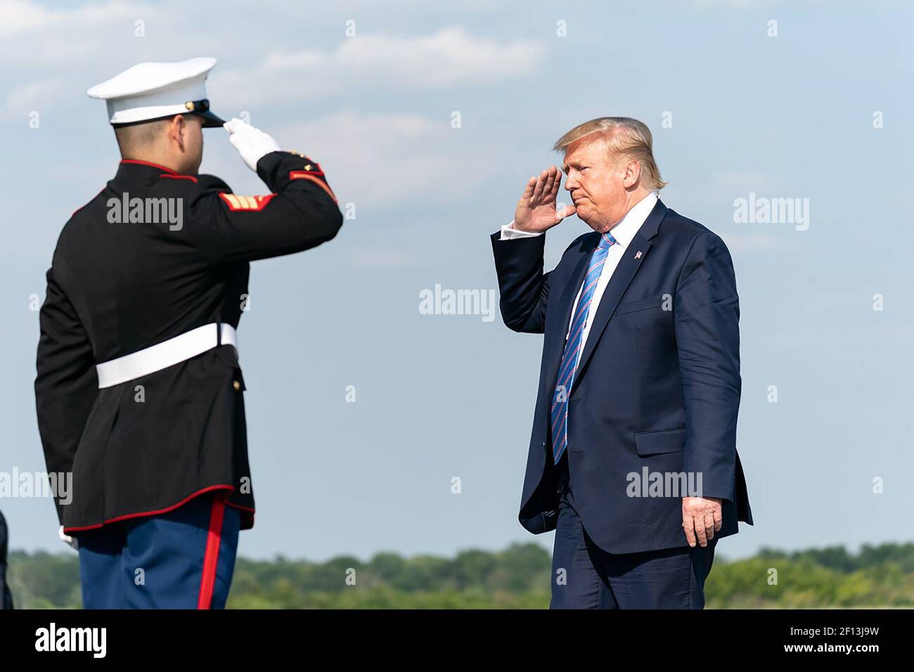President trump saluting a marine hi-res stock photography and images ...