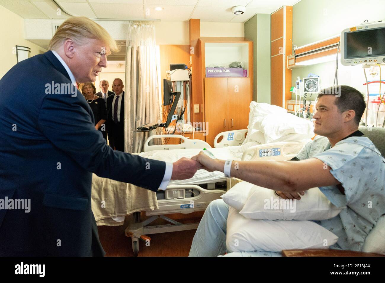 President Donald Trump and First Lady Melania Trump meet with survivors ...