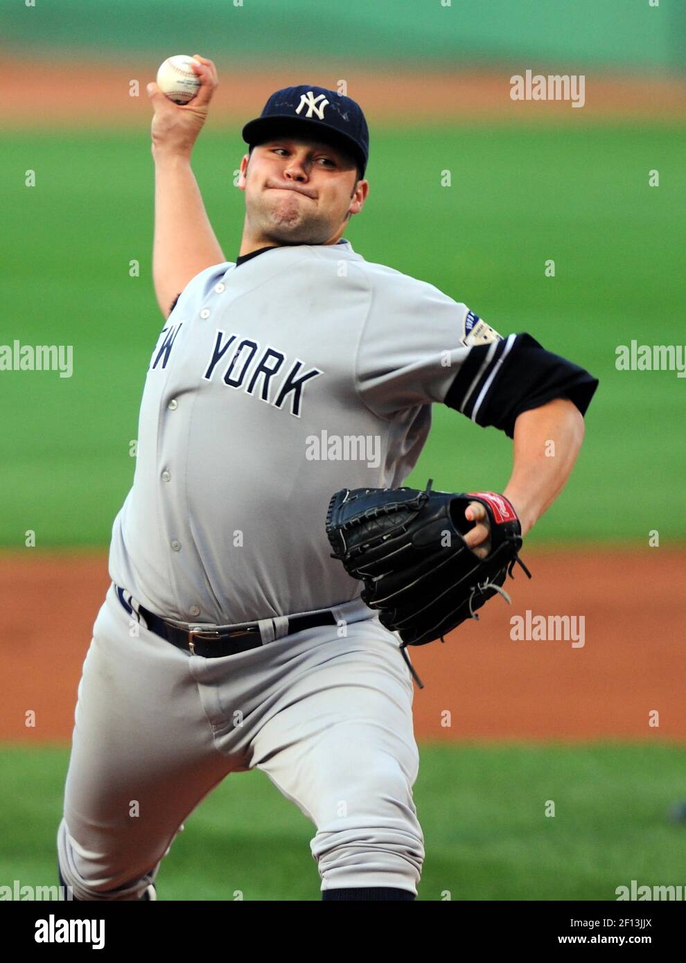 New York Yankees' Joba Chamberlain pitches in the first inning against ...