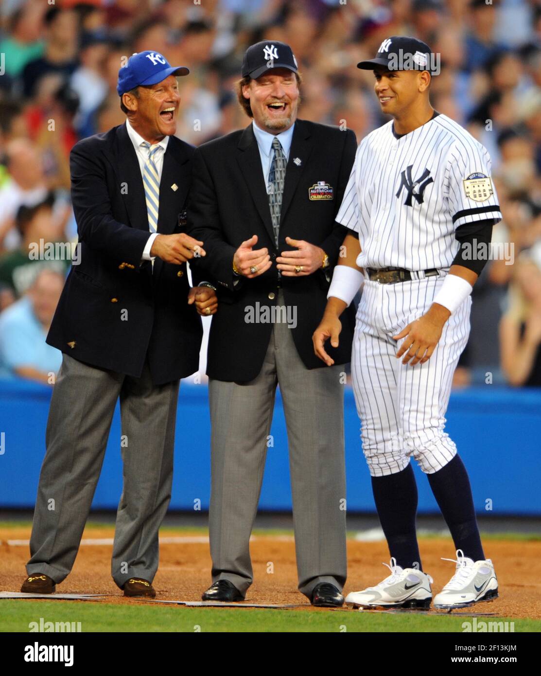 American League All-Star third baseman Alex Rodriguez (right) stands ...