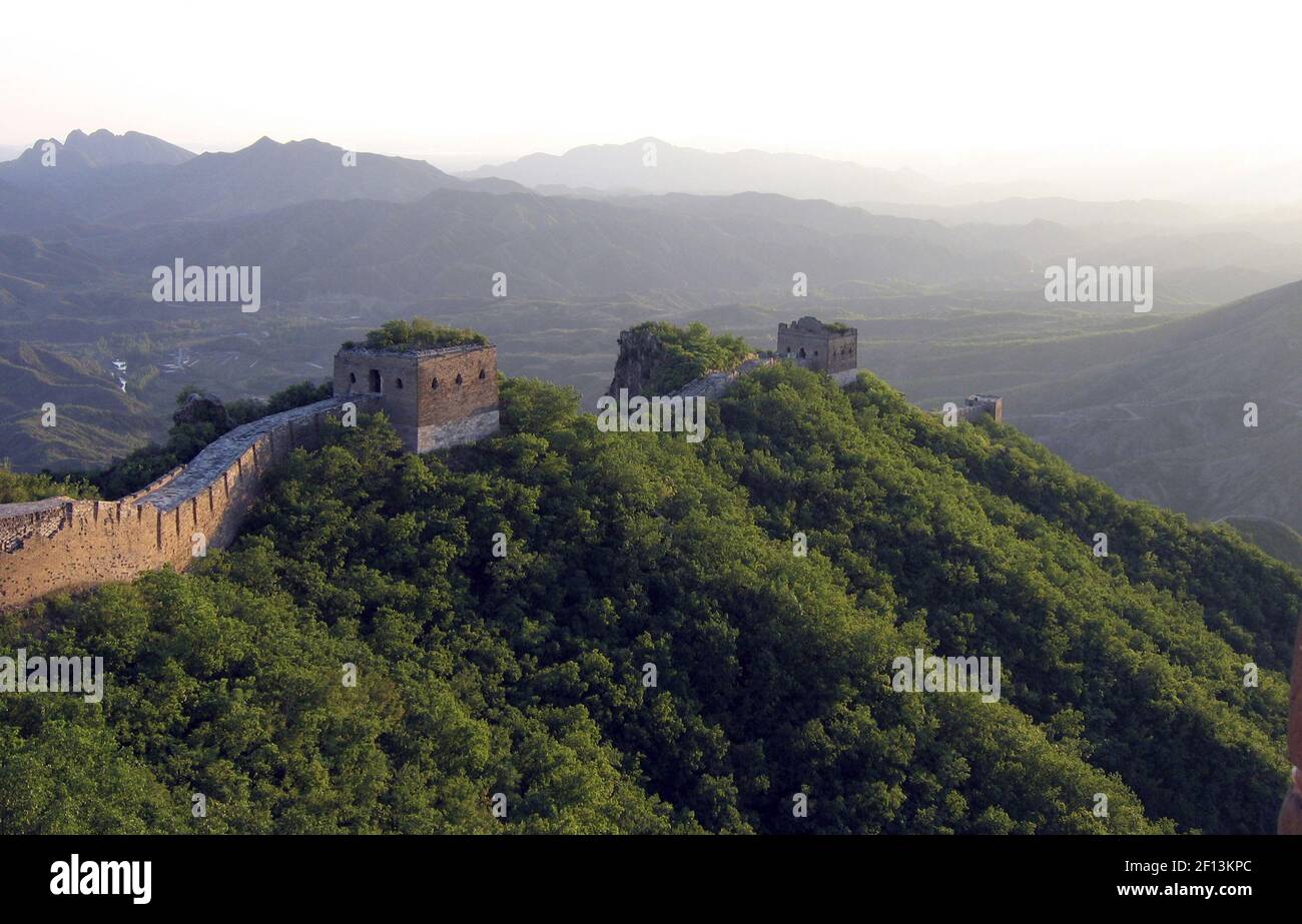 On some portions of the Great Wall of China, the lush mountainside ...