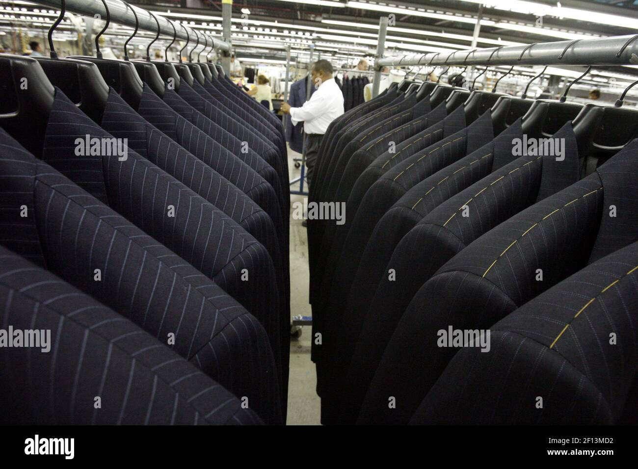 Suit jackets are lined up at the Hartmarx Company in Des Plaines ...