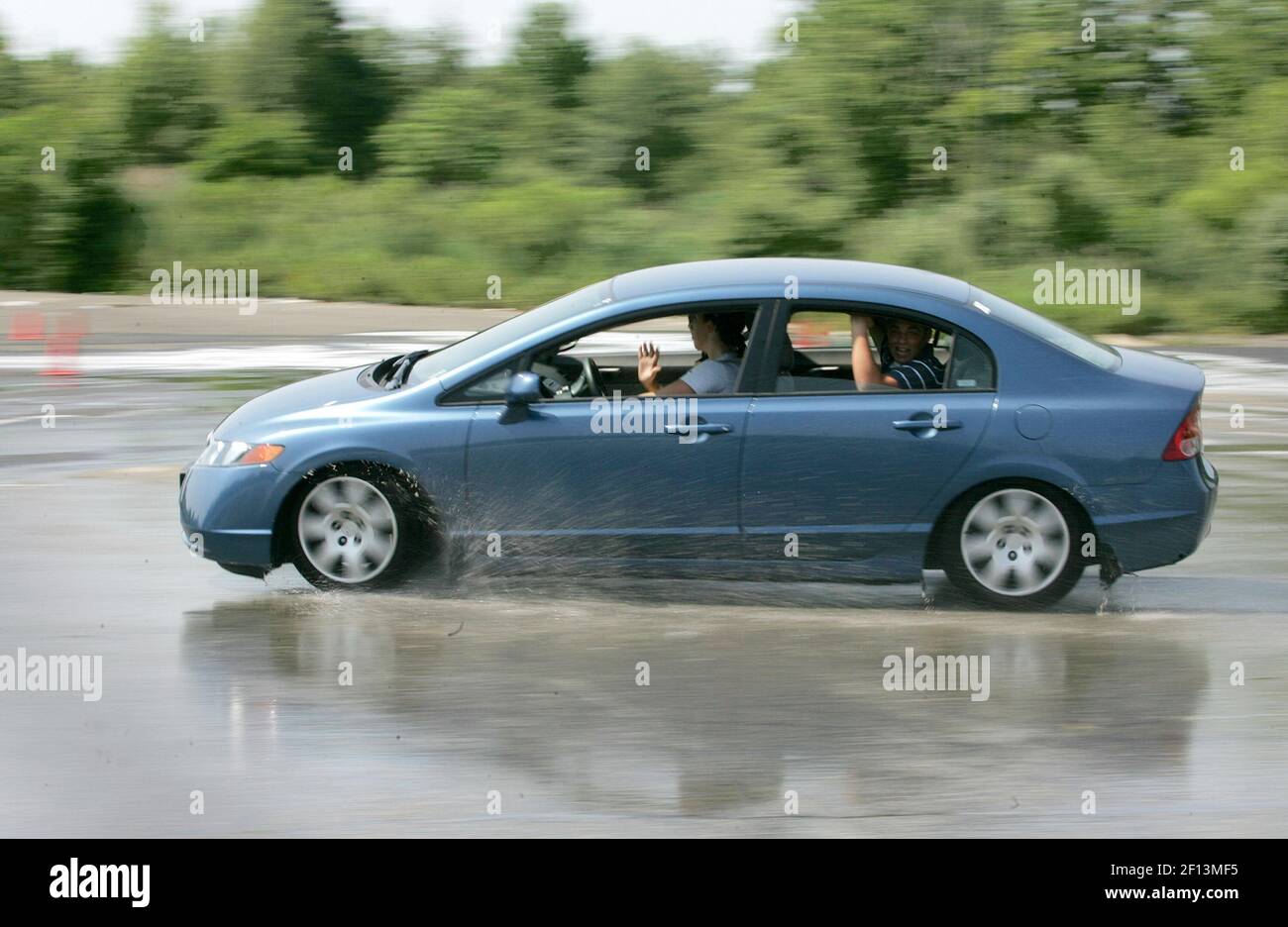Erin Ferguson maneuvers through the skid pad during Tire Rack Teen ...