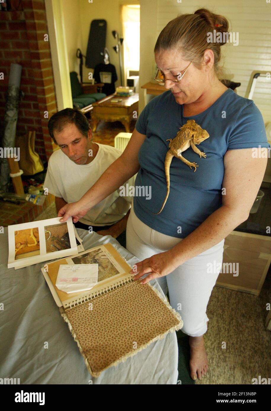 Barbara Witte holds Zak and Wheezie on her chest as she and her husband ...