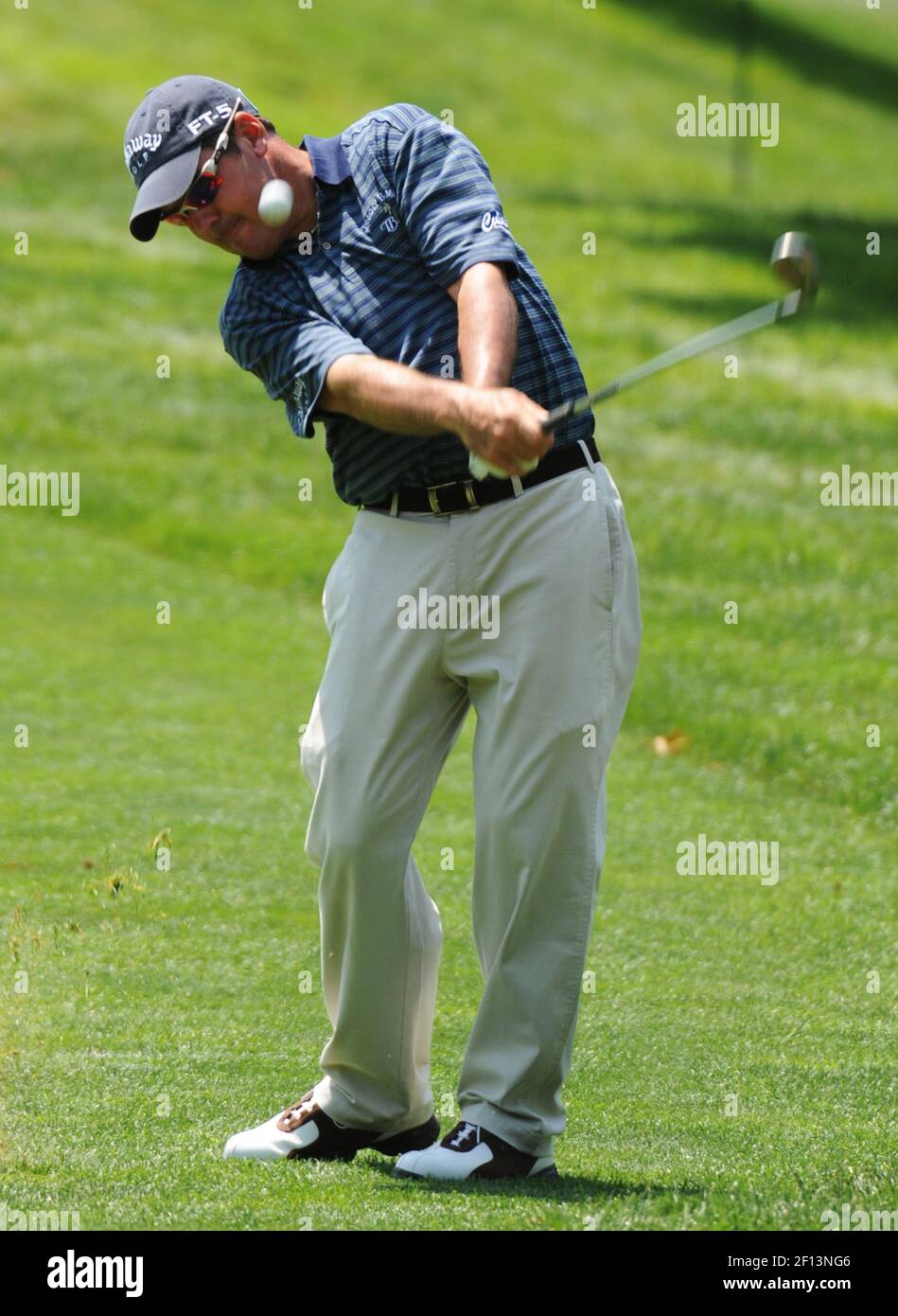 Rich Beem hits onto the 4th green in the first round of the AT&T ...