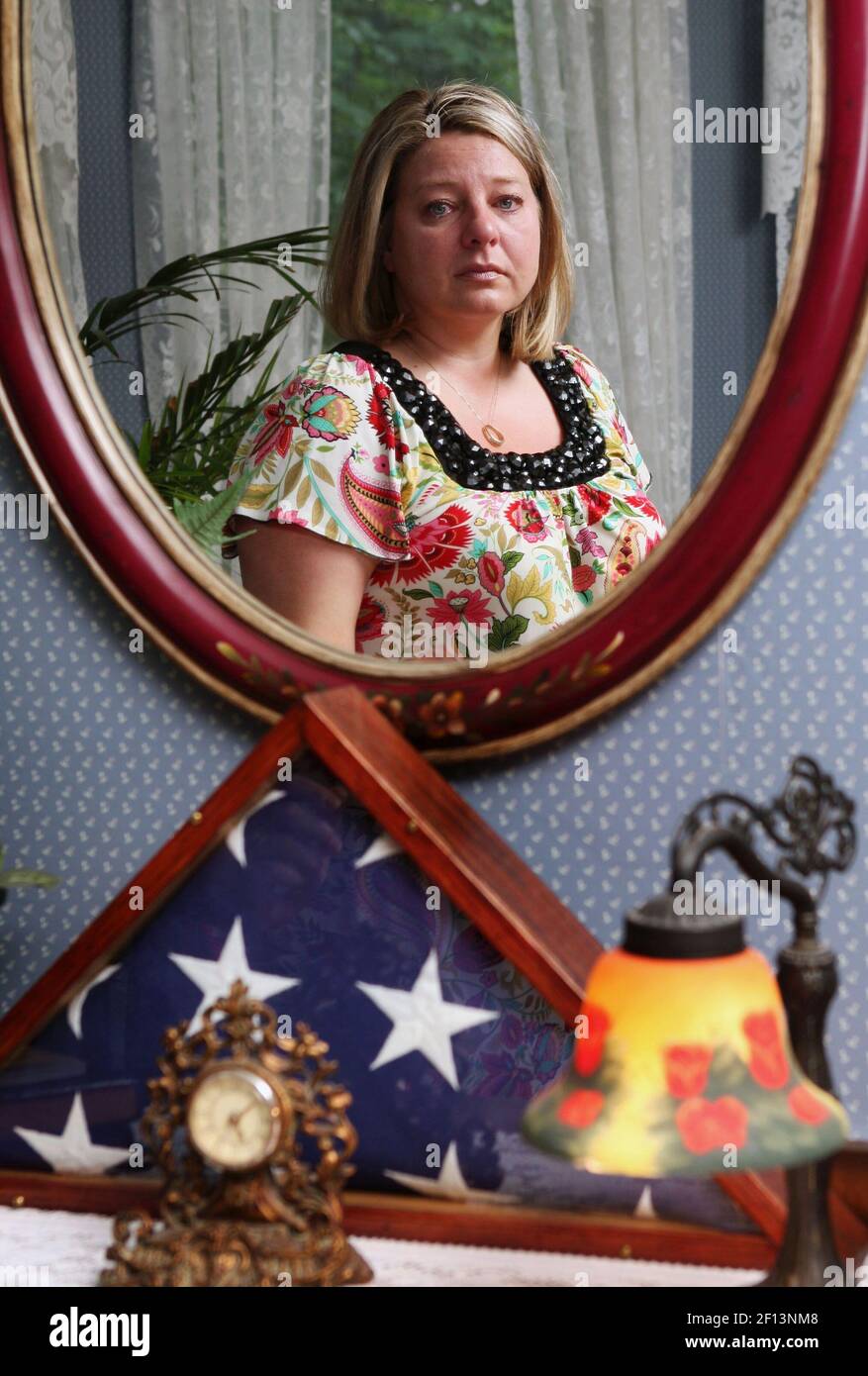 Michelle Cook, pictured June 17, 2008, was given this U.S. flag during ...