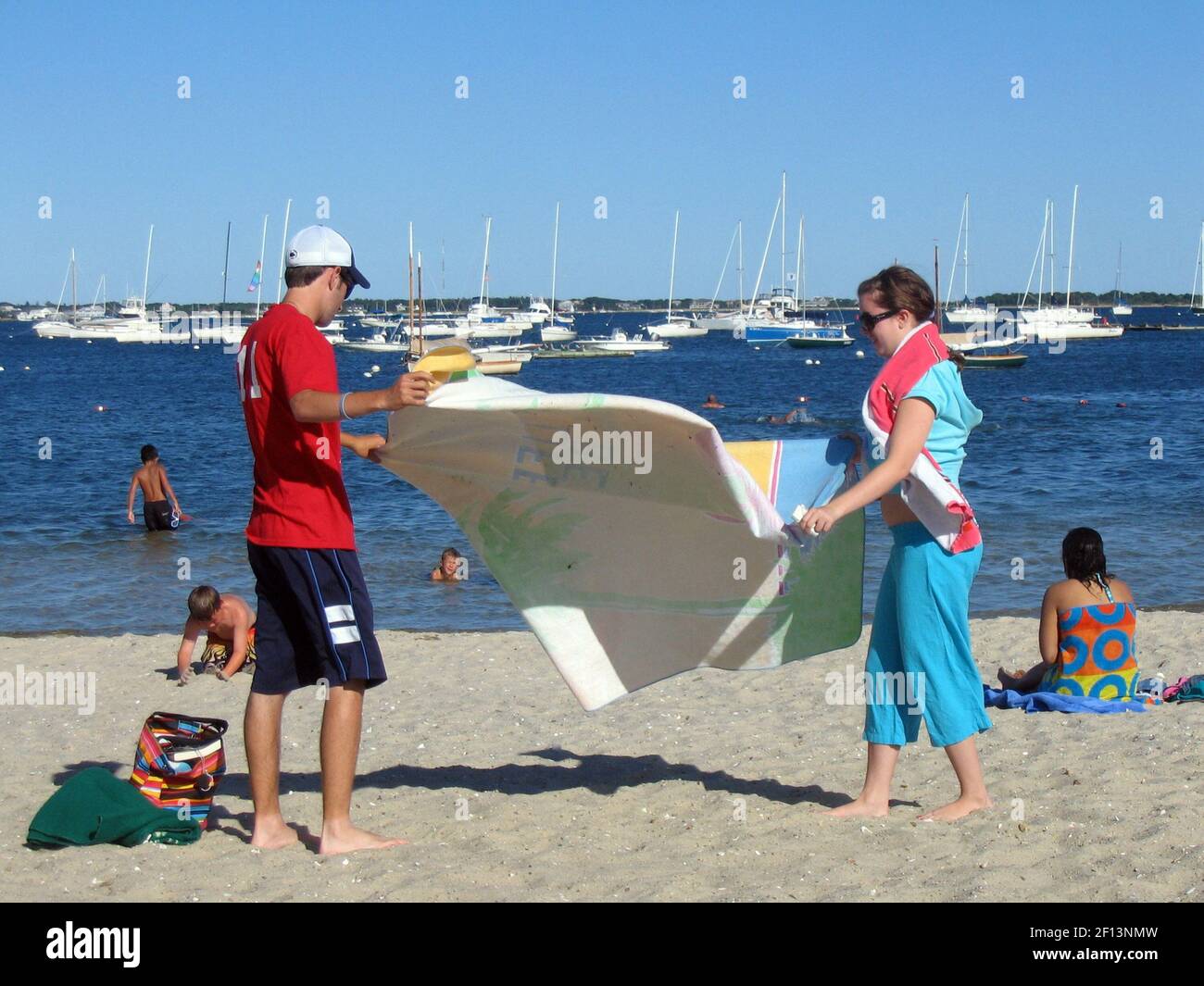 Eric and Rebecca set up on Veterans Beach in Hyannis for some rays and ...