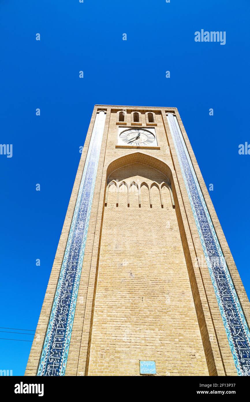 In iran antique clock tower Stock Photo - Alamy