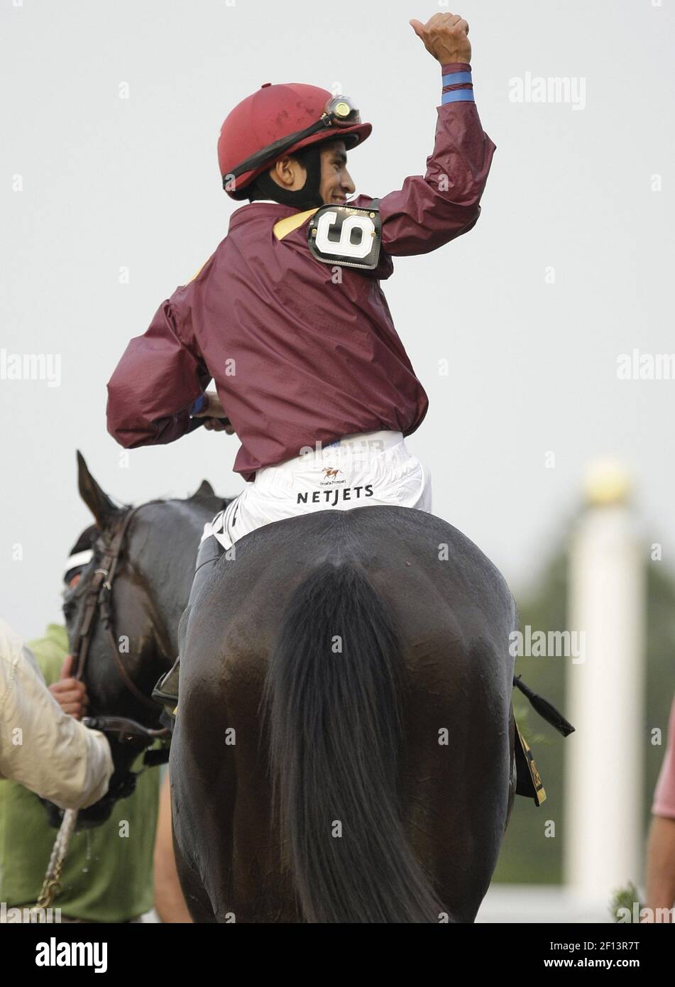 Alan Garcia up salutes the crowd after riding Da'Tara to a win in the ...
