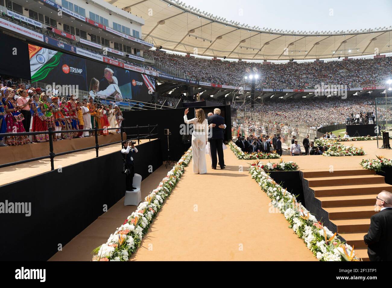 First Lady Melania Trump waves to the crowd as President Donald Trump ...