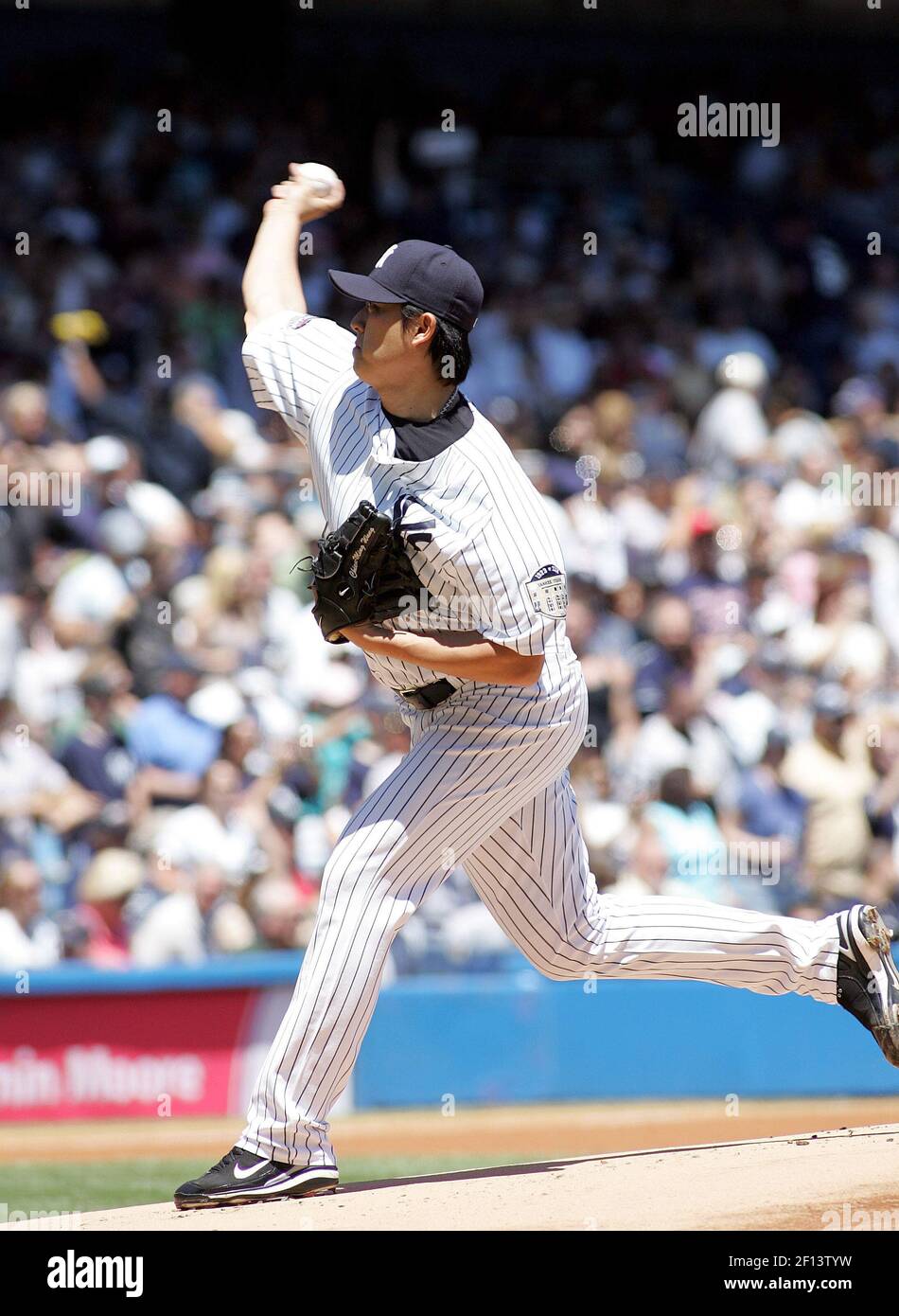 New York Yankees' Chien-Ming Wang pitches against the Seattle Mariners ...