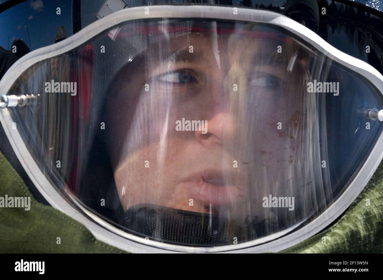 Army Staff Sgt. Sean Sandwick views his surroundings from behind the ...