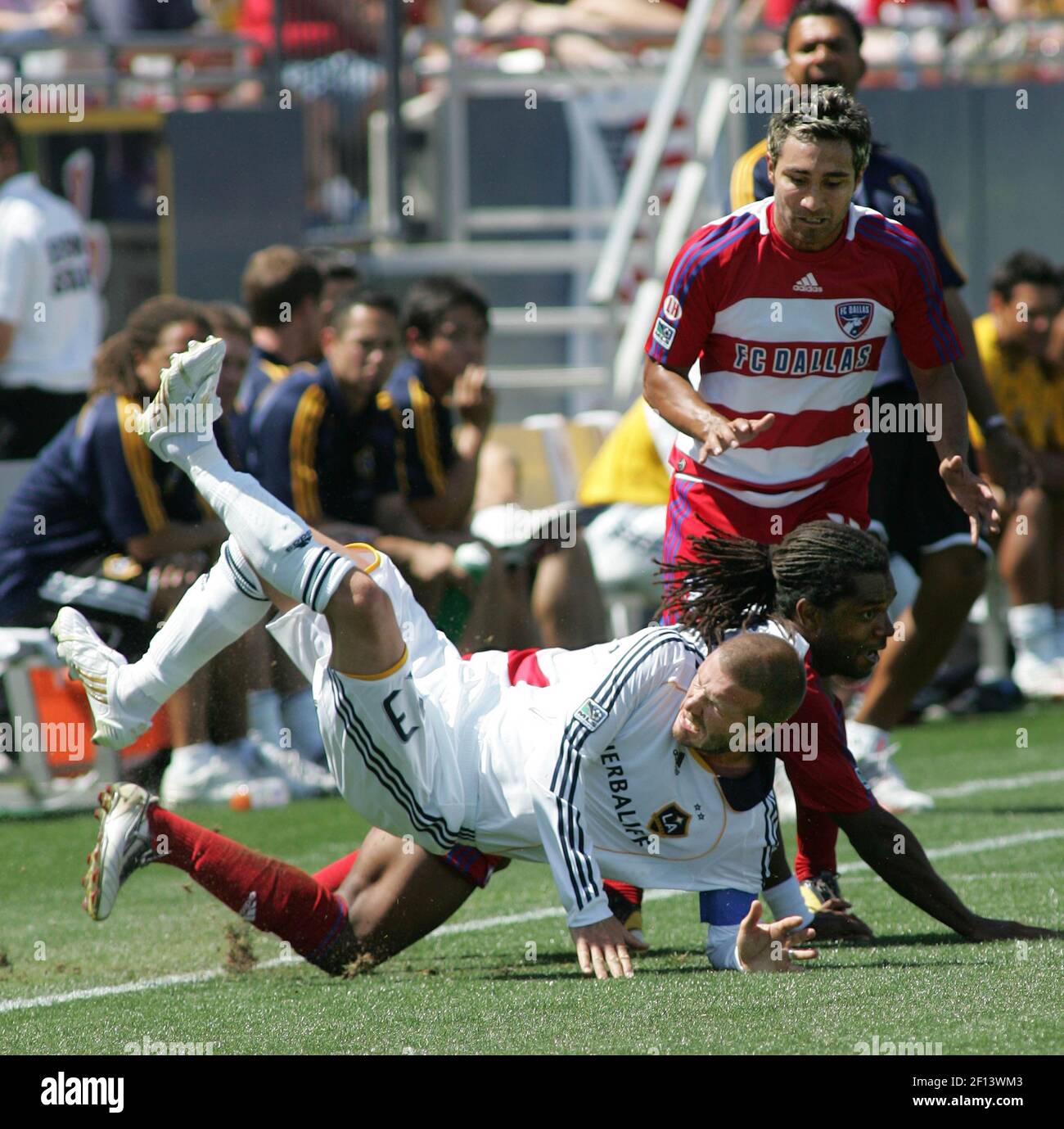 Los Angeles Galaxy's David Beckham is fouled as he is upended by FC ...