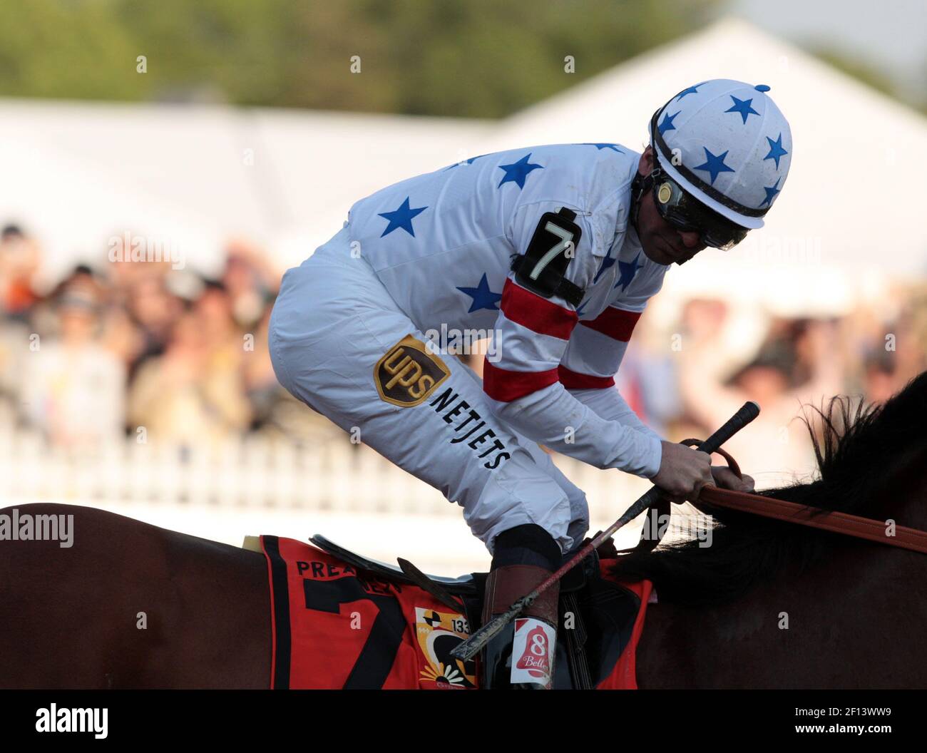 Rider Kent Desormeaux slows Big Brown down after his victory in the ...