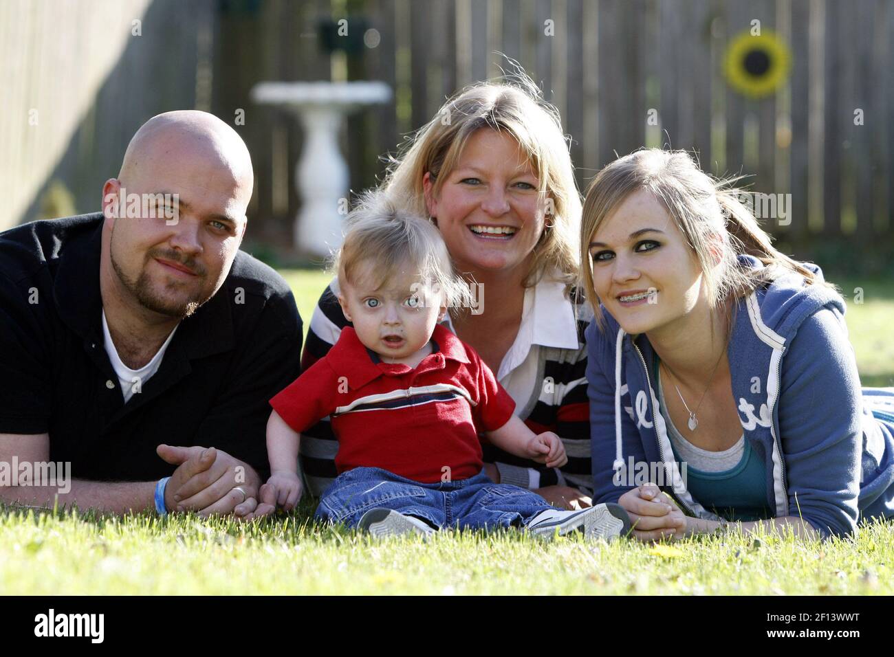 Brandon and Tina Pickard pose with their kids, Zach Pickard, 14 months ...