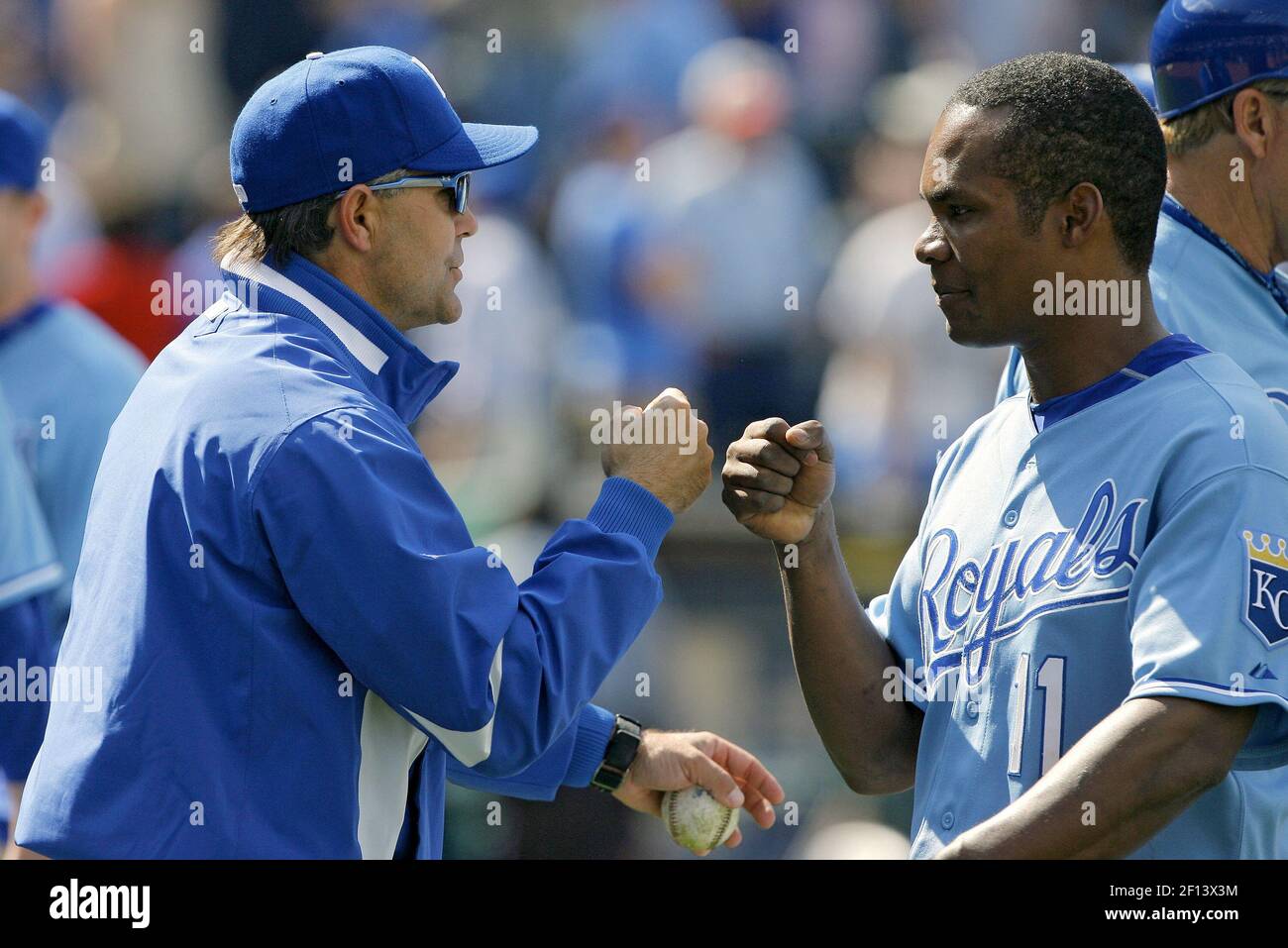 Kansas City Royals manager Trey Hillman greets Jose Guillen after the ...