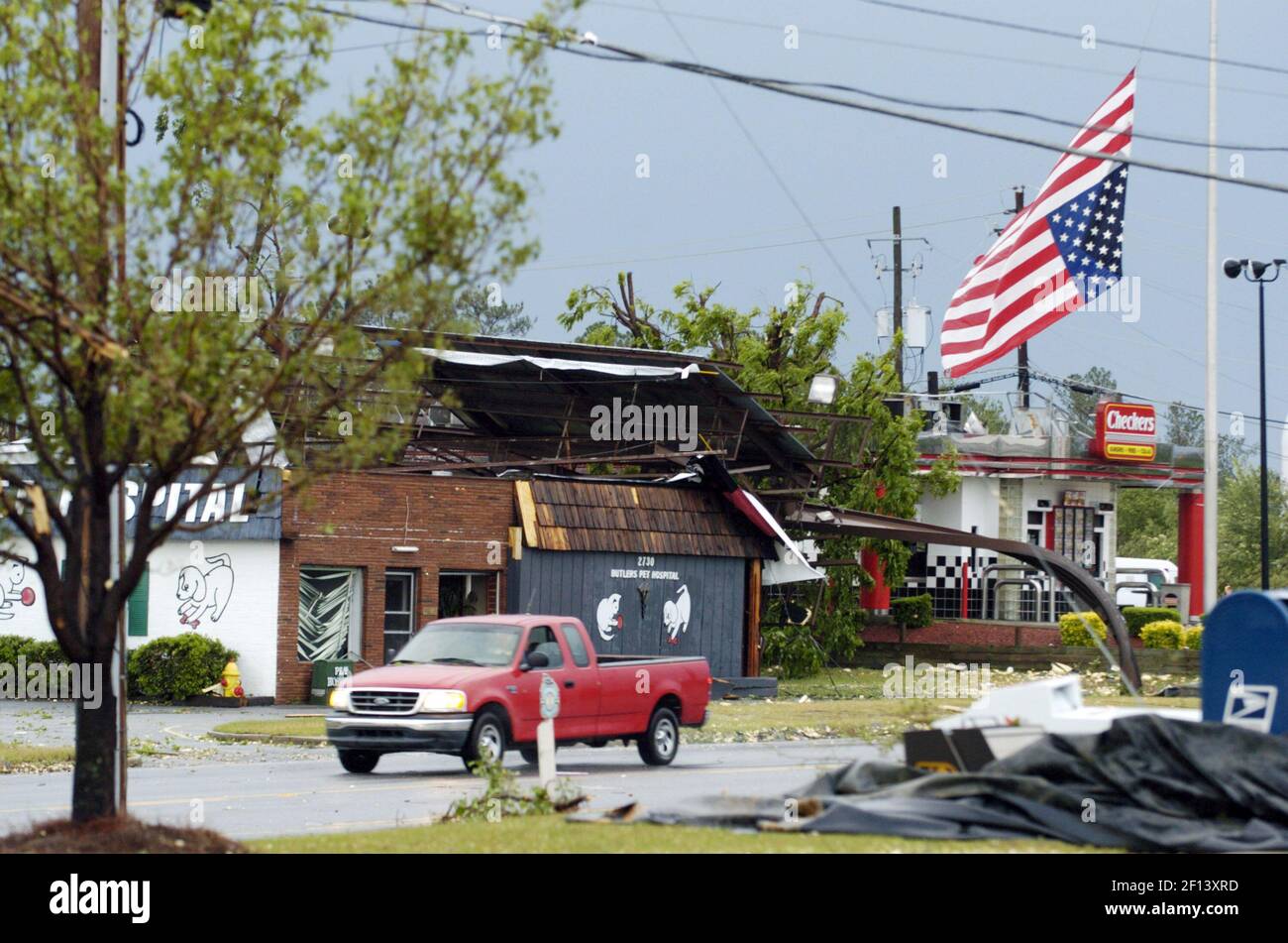 A billboard was bent by the winds after strong storms early Sunday ...