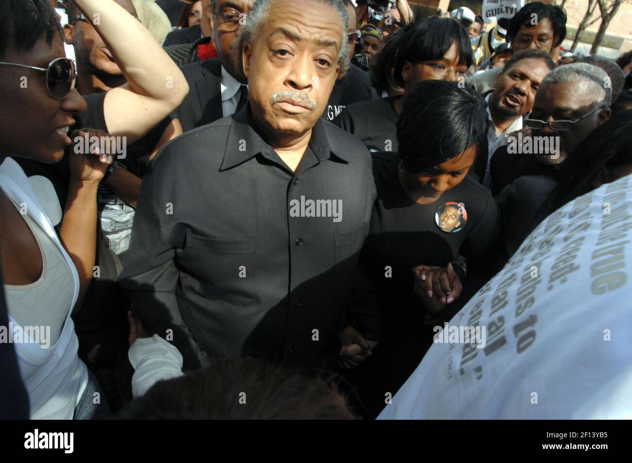Rev. Al Sharpton leads a protest against the three New York City Police ...