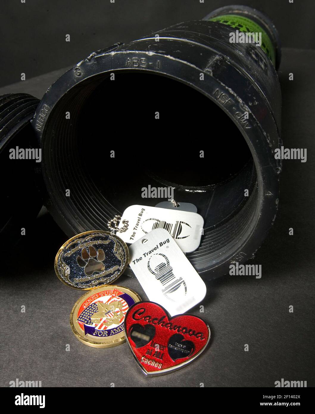 Geocoins and travelbugs that contain serial numbers are placed inside ...