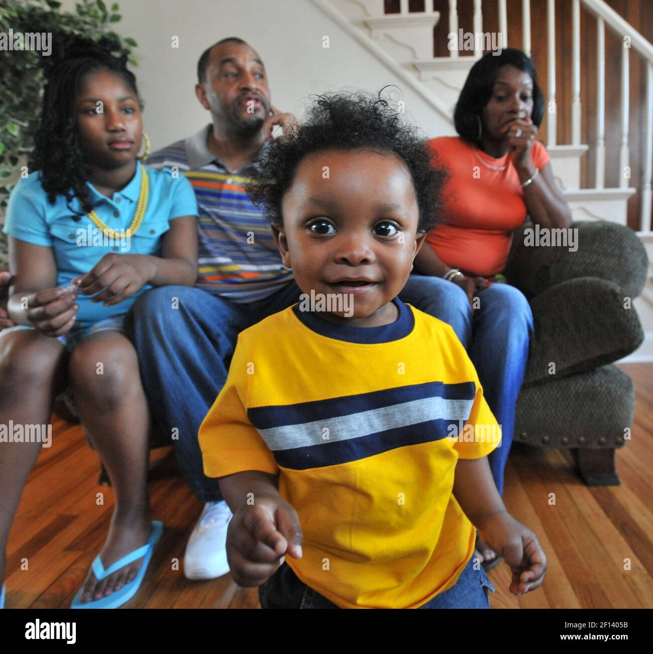 Delon Martin Jr., 1, here with (from right) his mother, Tressa; father ...