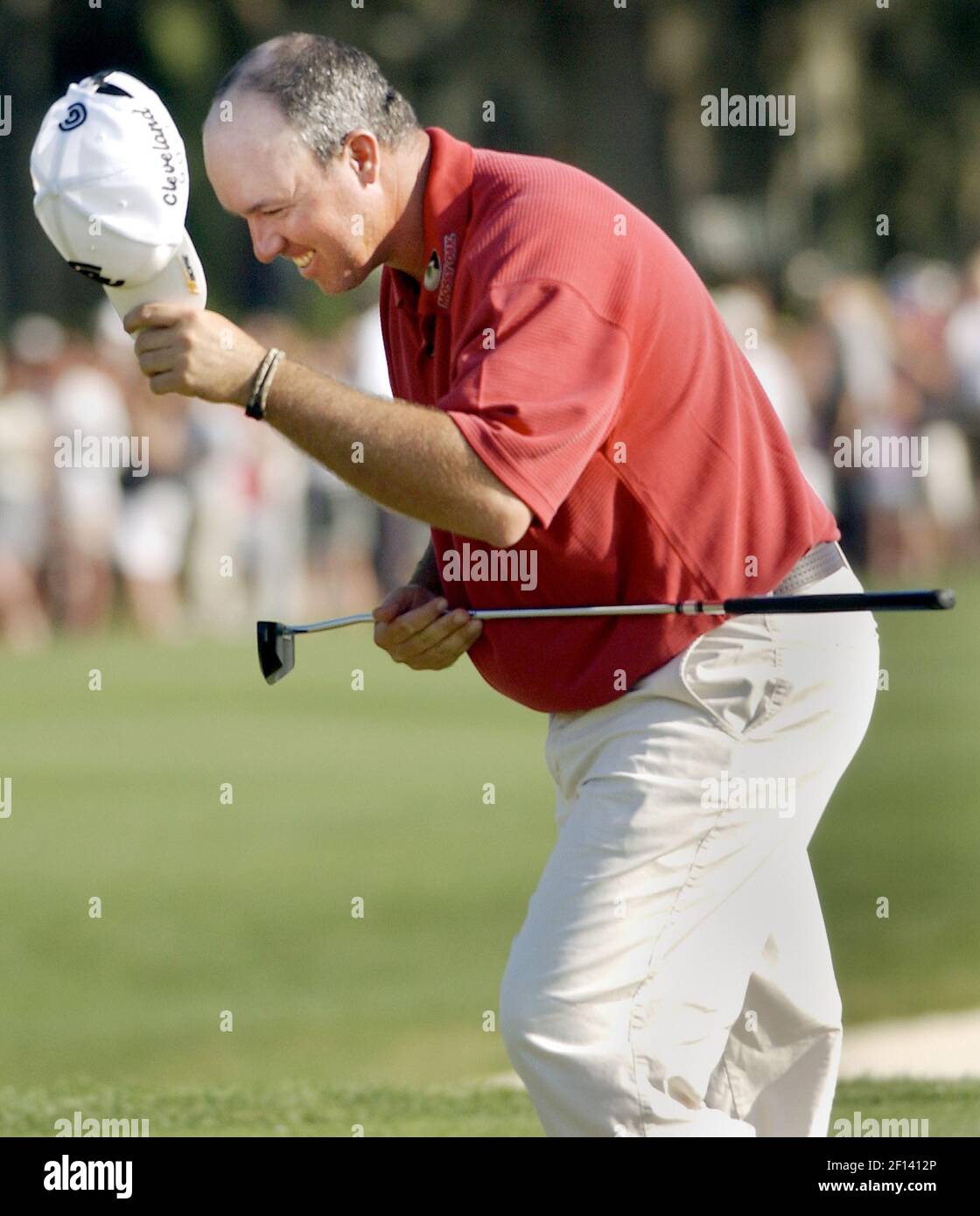 Boo Weekley tips his hat to the crowd at the 18th hole, after securing ...