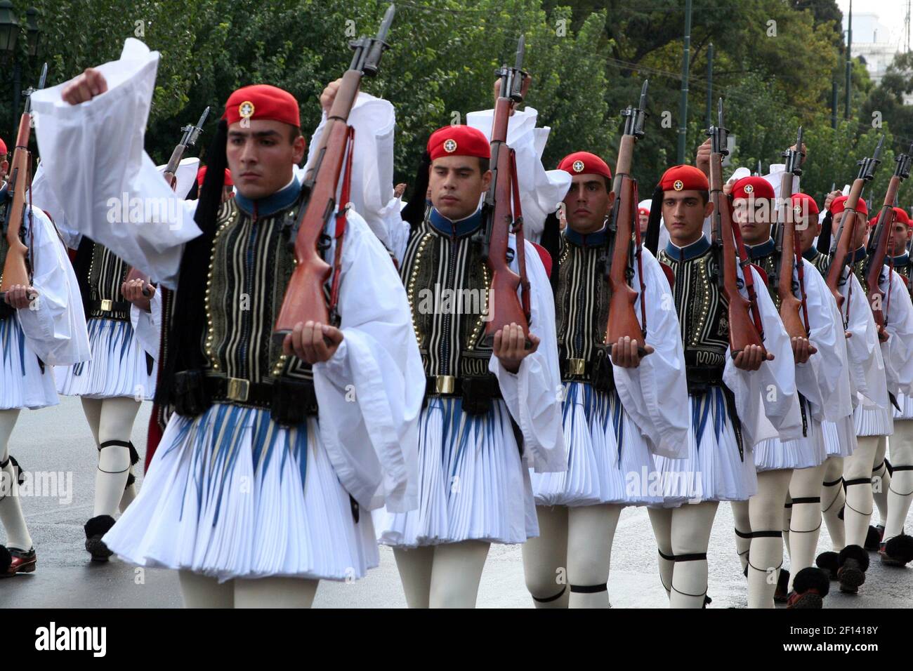 The changing of the Evzone Guard puts a cadre of soldiers on the street ...
