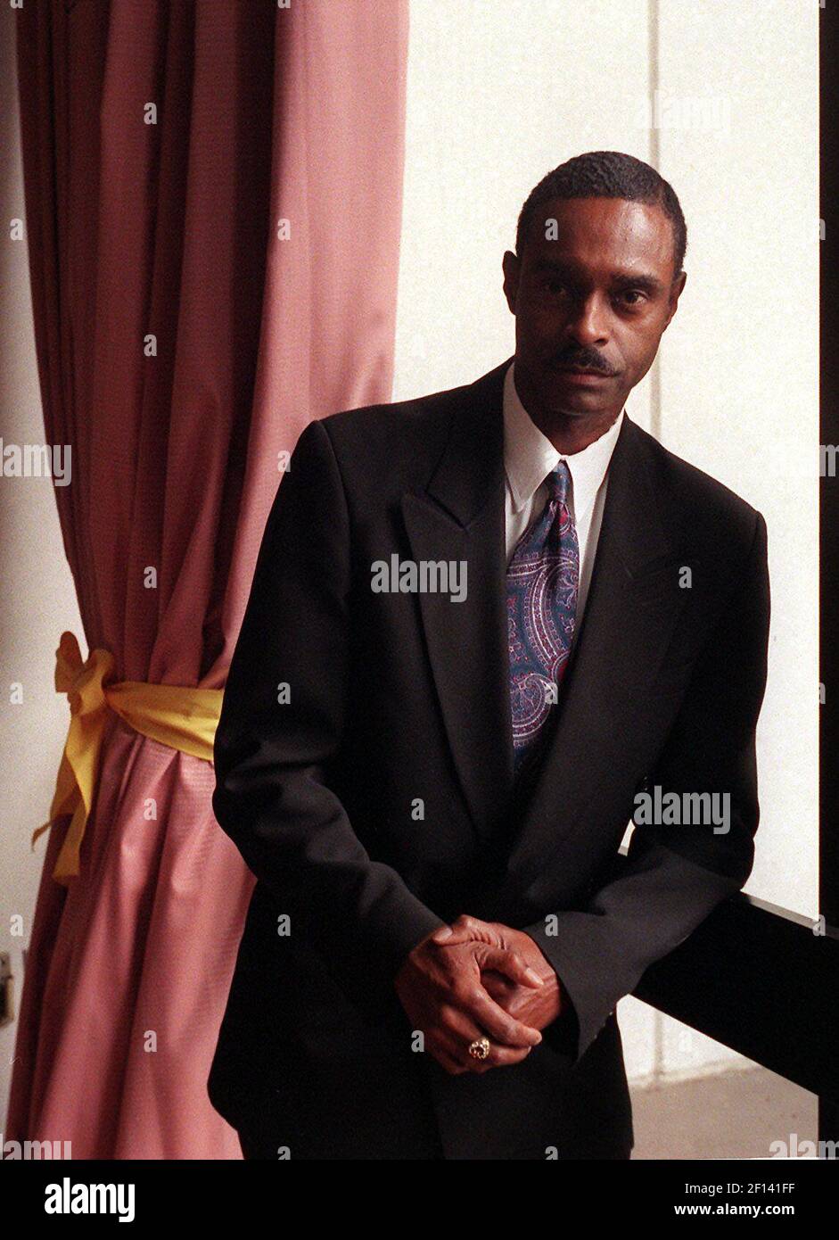 Activist John Muhammad, shown here in 1999, seeks to stop the spread of ...