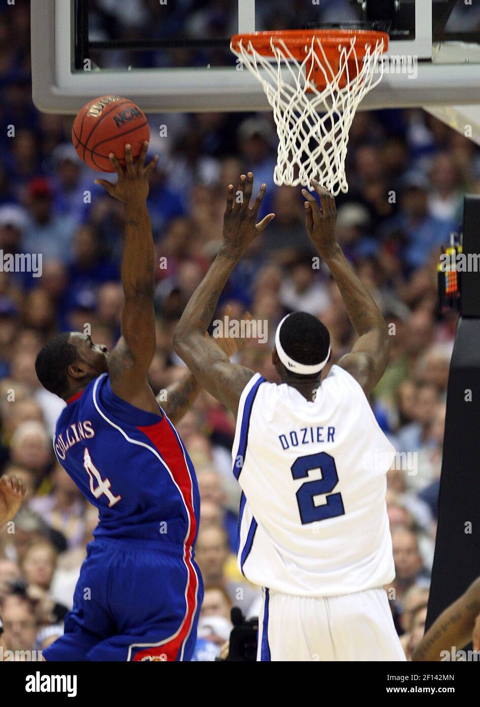 Kansas Sherron Collins (4) drives to the basket against Memphis Robert ...
